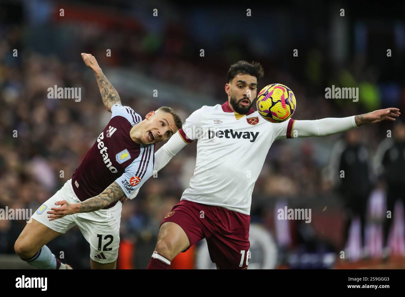 Lucas Digne of Aston Villa heads clears despite pressure from Lucas ...