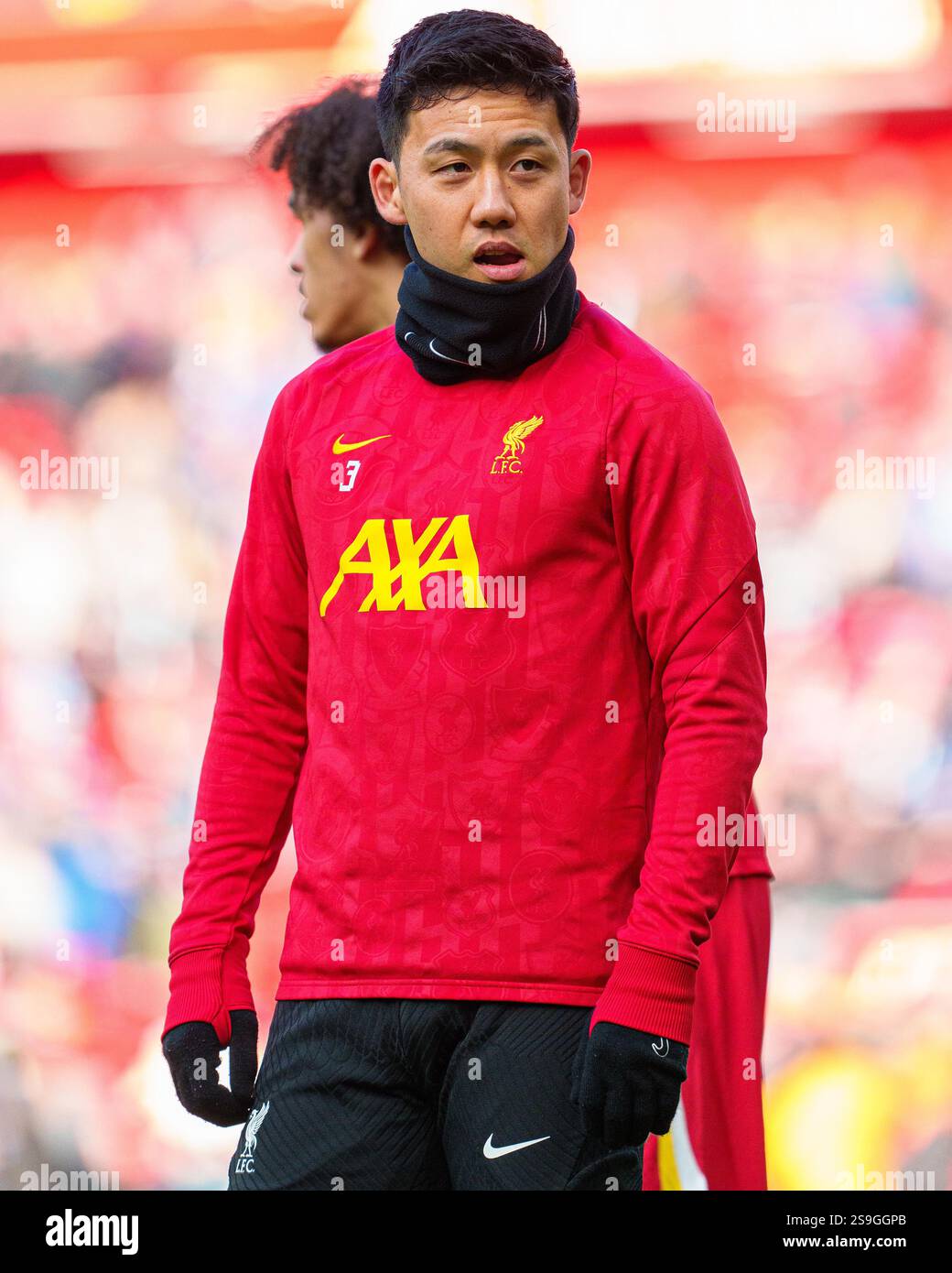 Liverpool's Wataru Endo is seen warming up during the Premier League ...
