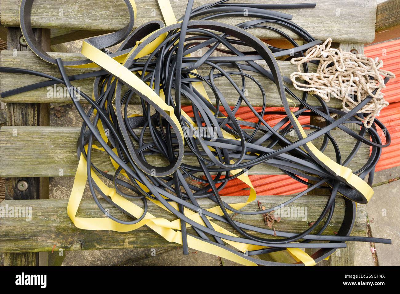 Rubber door seal waste Stock Photo - Alamy