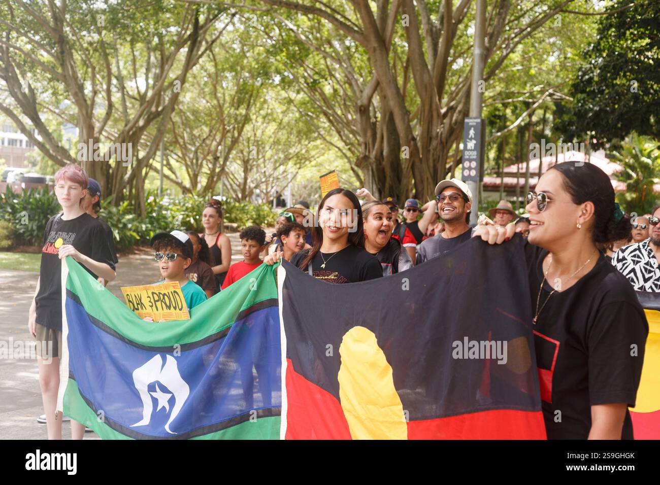 Cairns, Australia. 26th Jan, 2025. Demonstrators march through the ...
