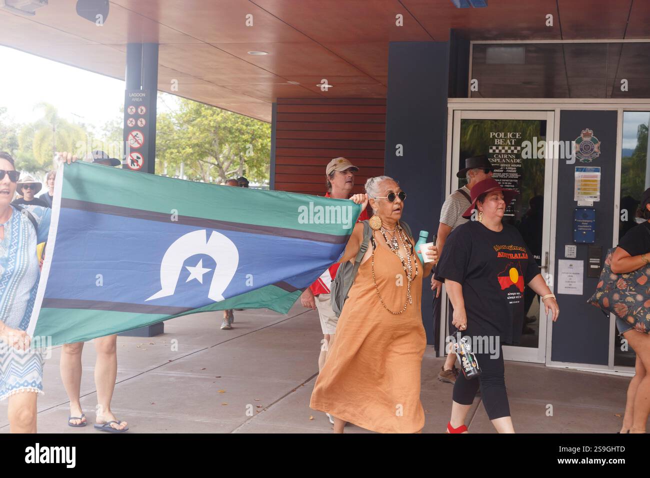 Cairns, Australia. 26th Jan, 2025. Demonstrators march through the ...