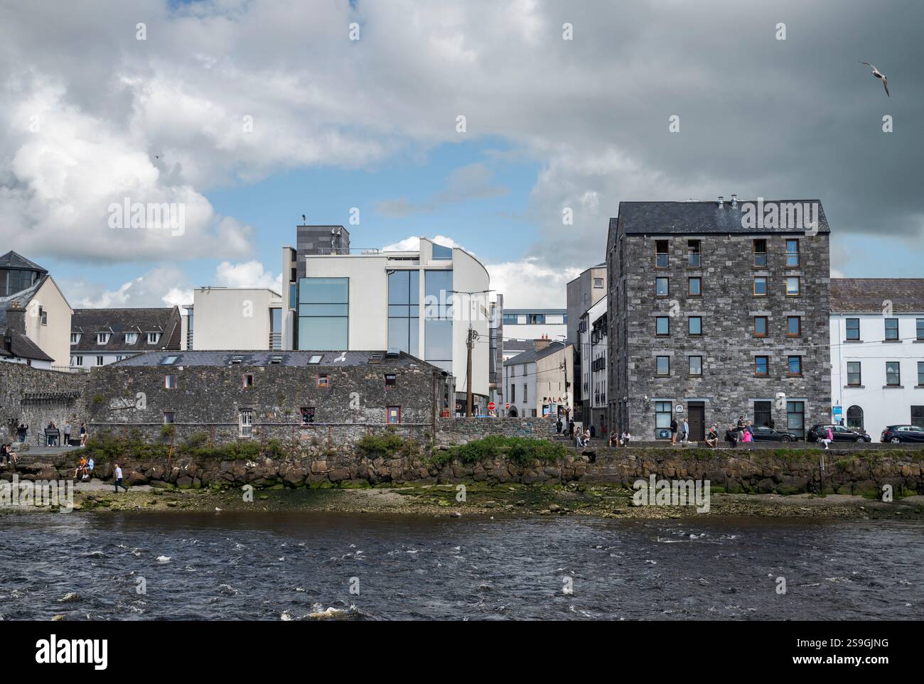 GALWAY, IRELAND – AUGUST 6, 2023: An urban riverside scene in Galway ...