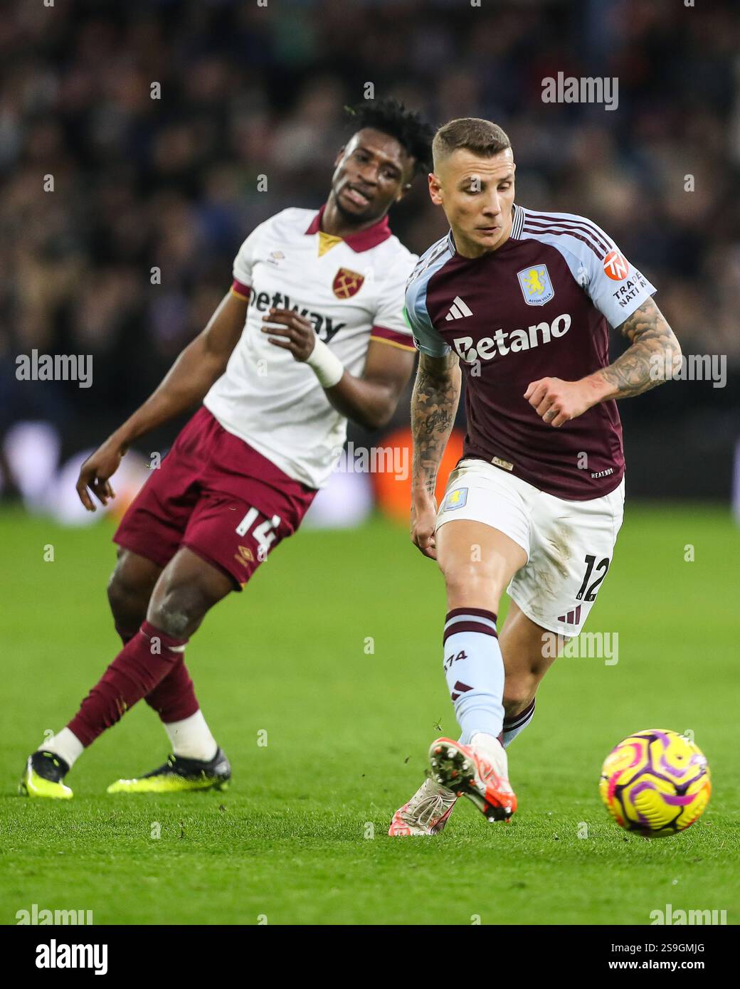 Lucas Digne of Aston Villa passes the ball during the Premier League ...