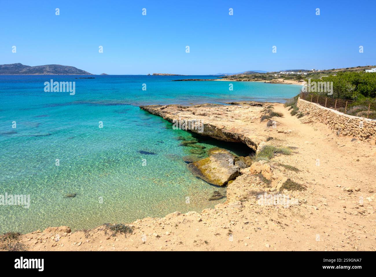 Ano Koufonisi beach with rocks and azure sea water. Small Cyclades ...