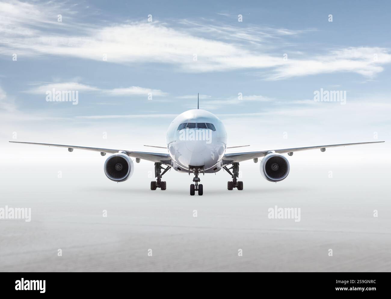 Front view of wide body passenger plane isolated on bright background ...