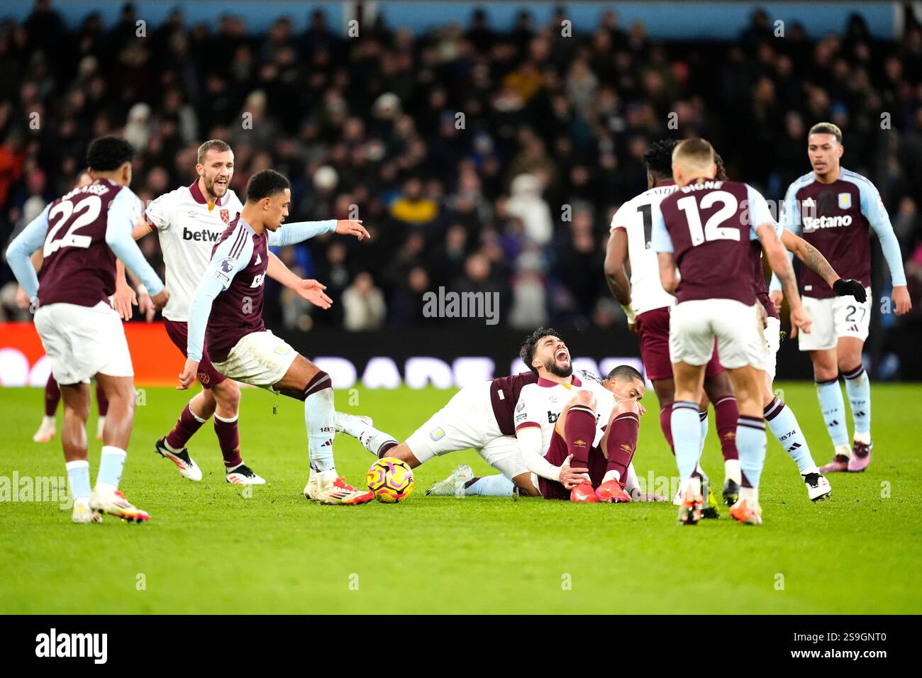 Aston Villa's Youri Tielemans challenges West Ham United's Lucas Paqueta during the Premier ...