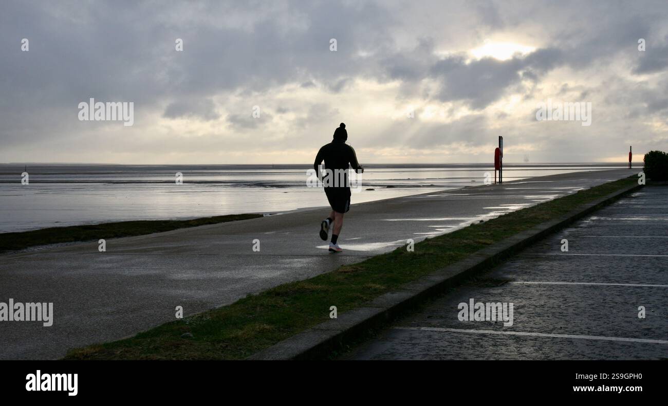 The loneliness of the long distance runner Stock Photo - Alamy