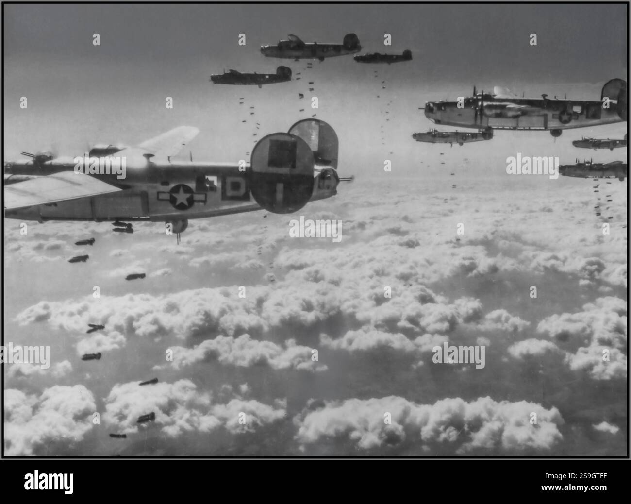 Ww2 usaf b 24 dropping bombs on a marshalling yard hi-res stock ...