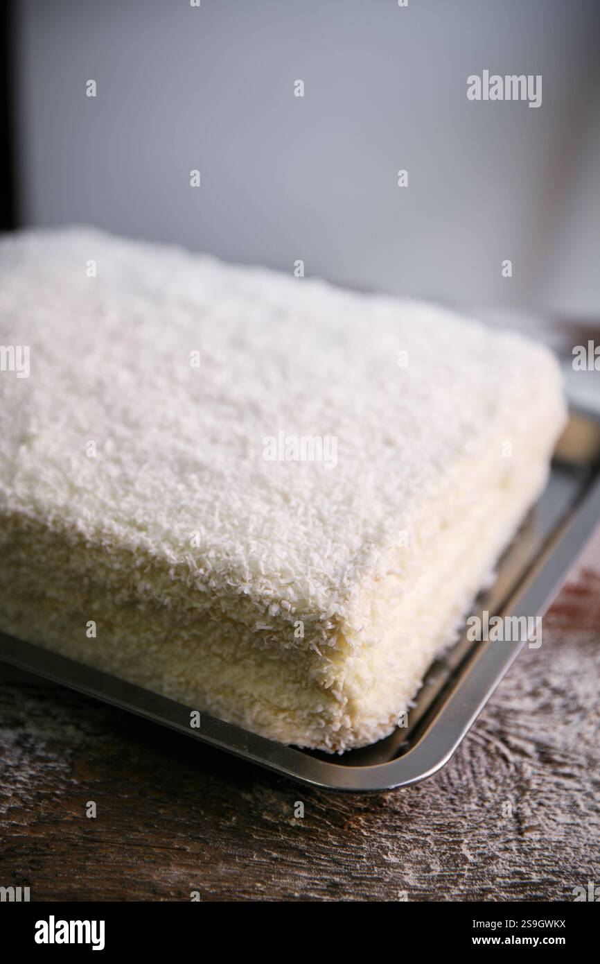 Delicious white Raffaello cake with coconut flakes Stock Photo - Alamy