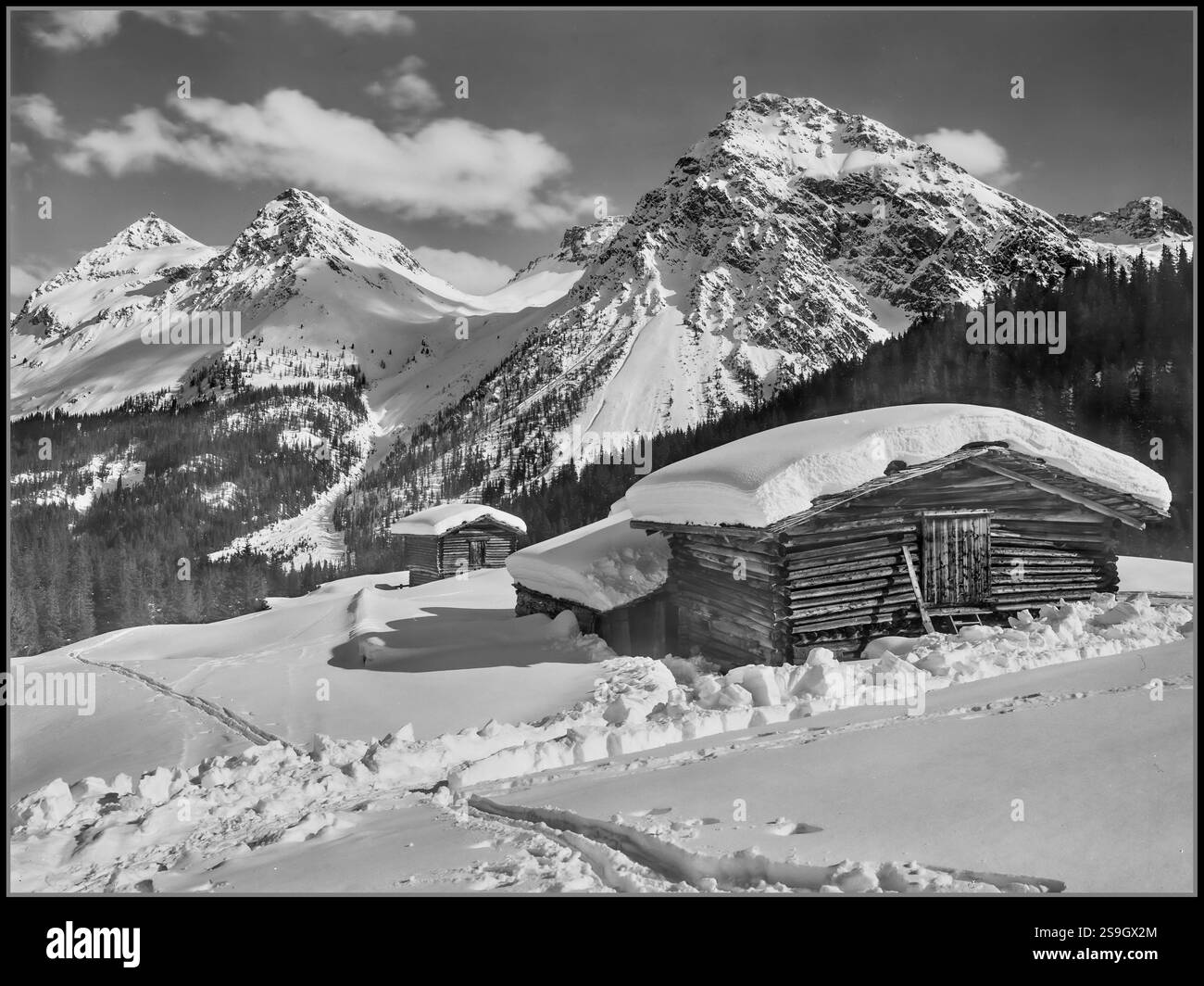 View of huts in snow Black and White Stock Photos & Images - Alamy