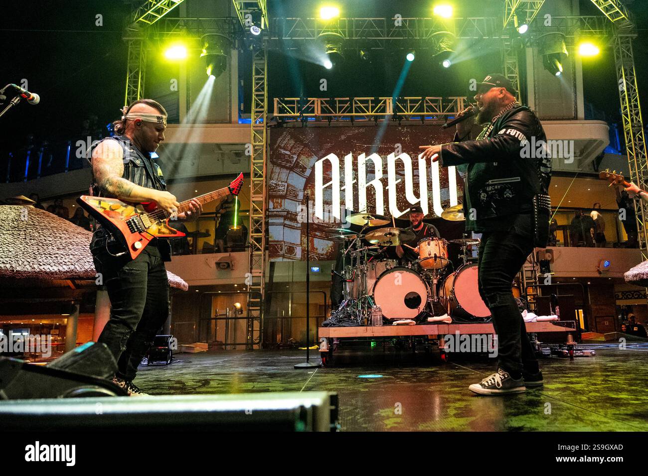 Dan Jacobs, left, and Brandon Saller of Atreyu perform on board the ...