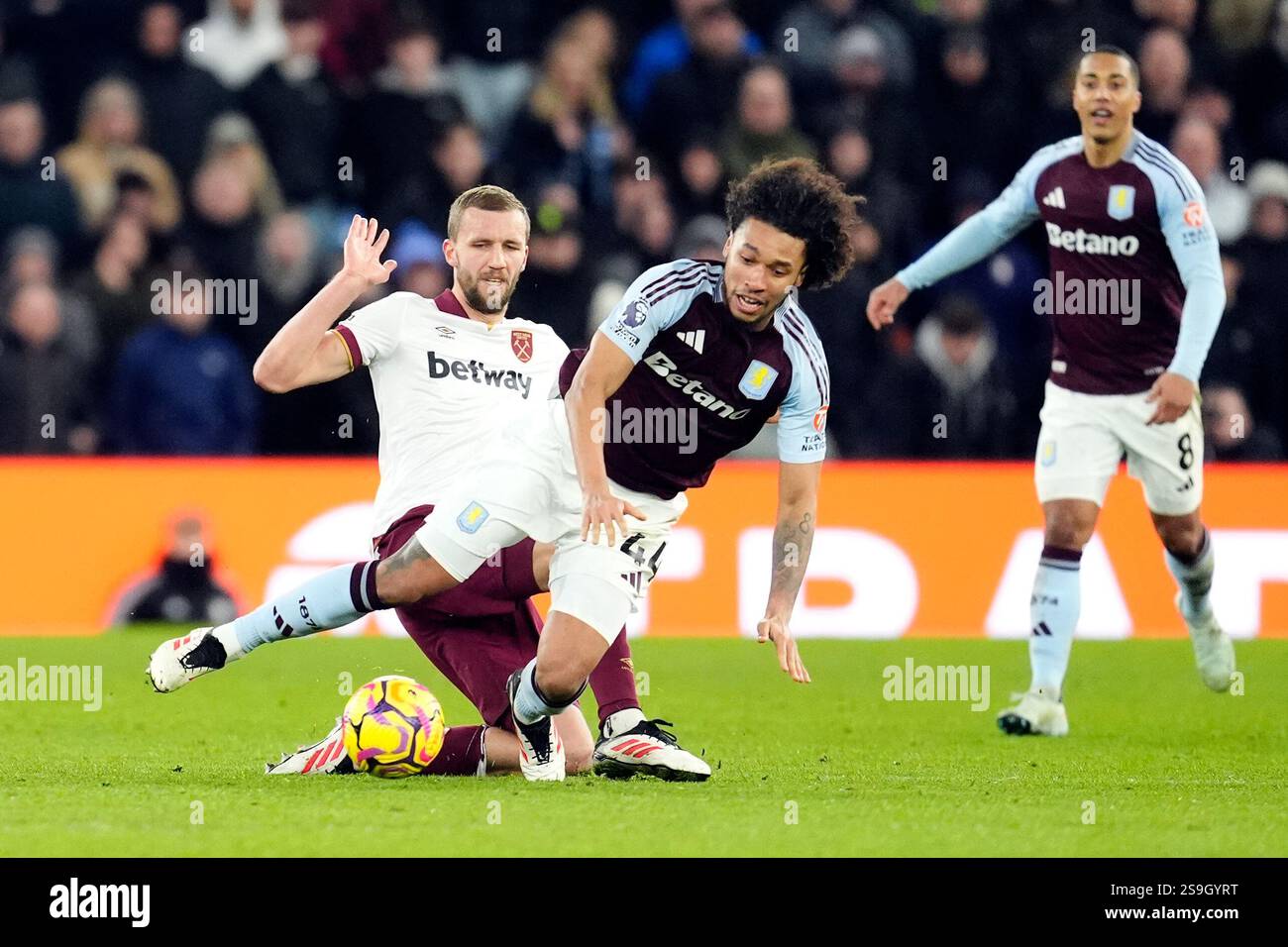 West Ham United's Tomas Soucek (left) challenges Aston Villa's Boubacar ...