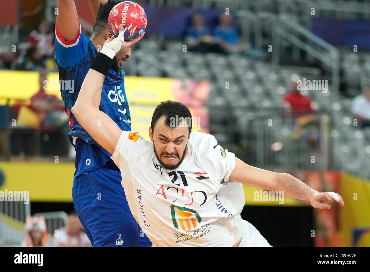 Egypt's Mohamed Tarek makes a shot during the main round match between ...