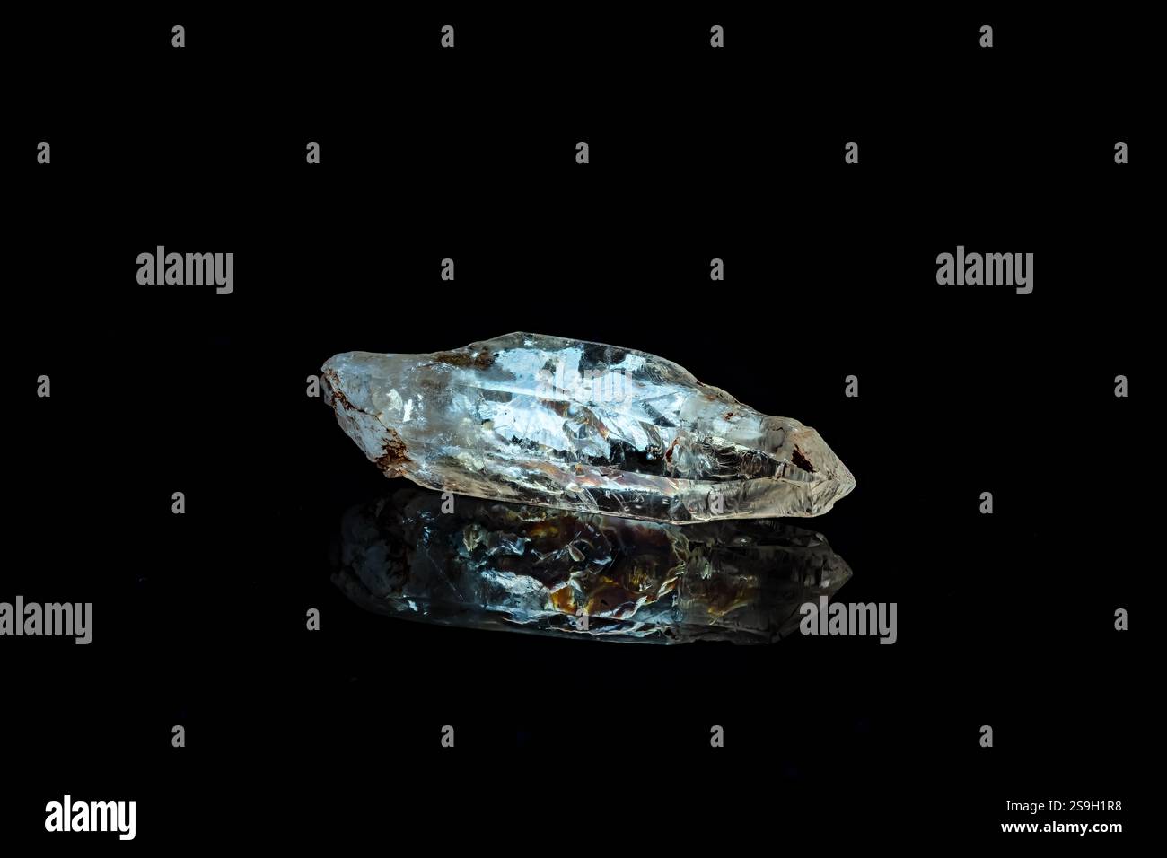 Hydrocarbon bubble trapped inside quartz appearing under short wave UV ...