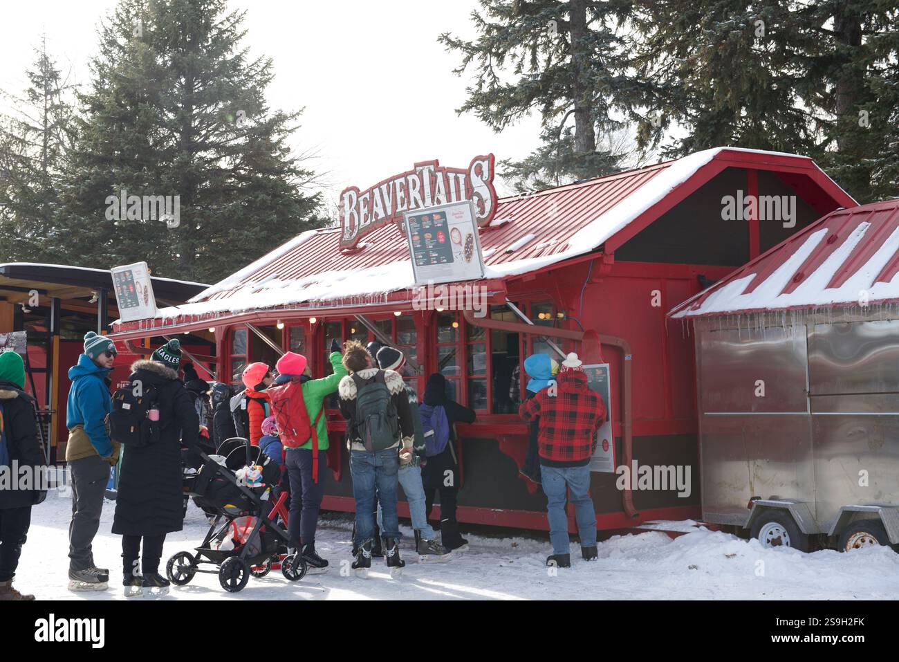 Skaters on the Rideau Canal in Ottawa enjoy the iconic BeaverTails ...