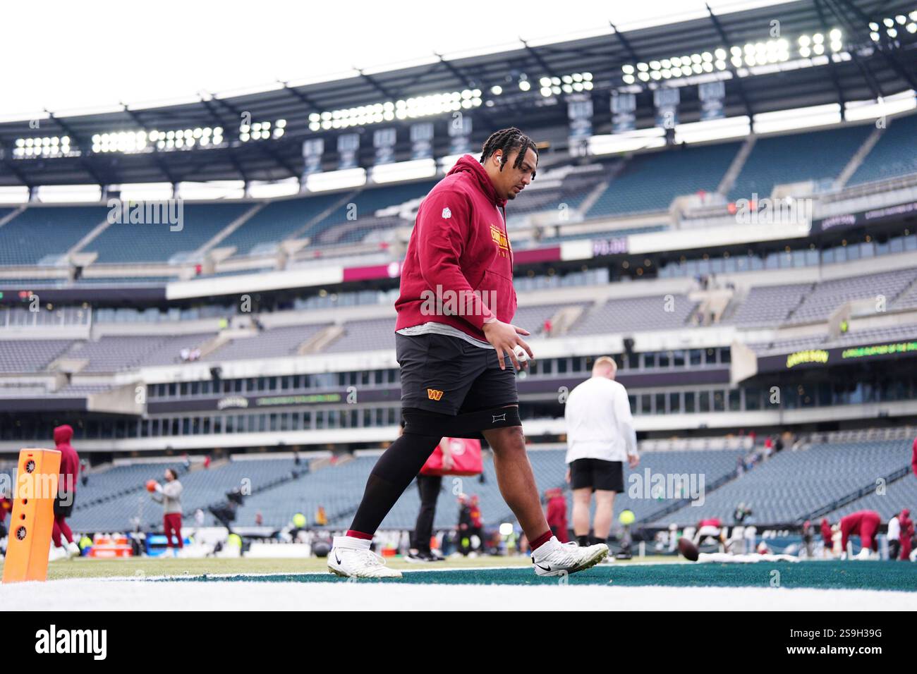 Washington Commanders offensive tackle Brandon Coleman warms up before ...