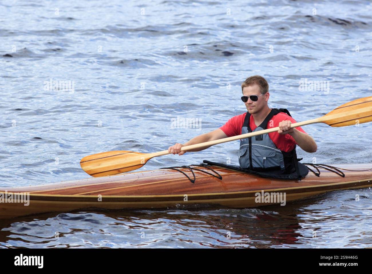 A kayaker on Lake Superior during the Tall Ships Festival in Duluth ...