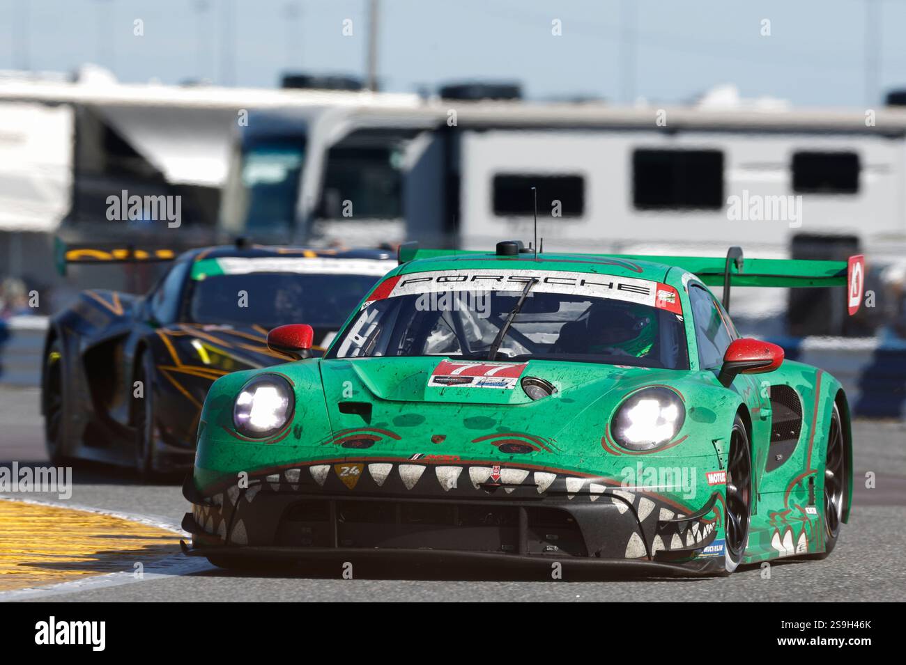 DAYTONA BEACH, FL - JANUARY 26: The #77 AO Racing Porsche 911 GT3 R ...