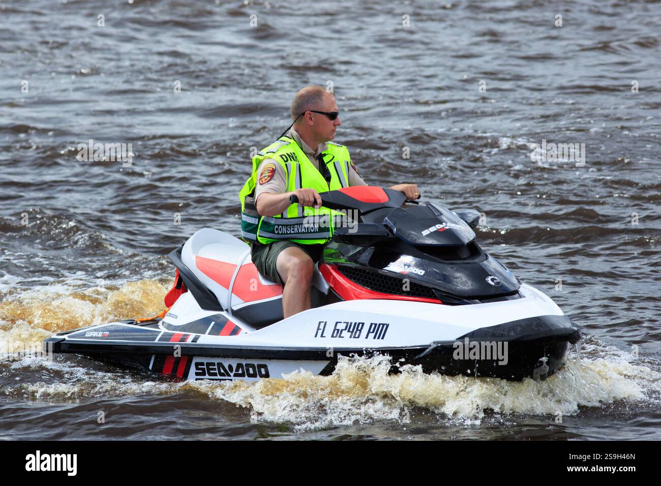 A Minnesota DNR Conservation Officer patrols on Lake Superior during ...