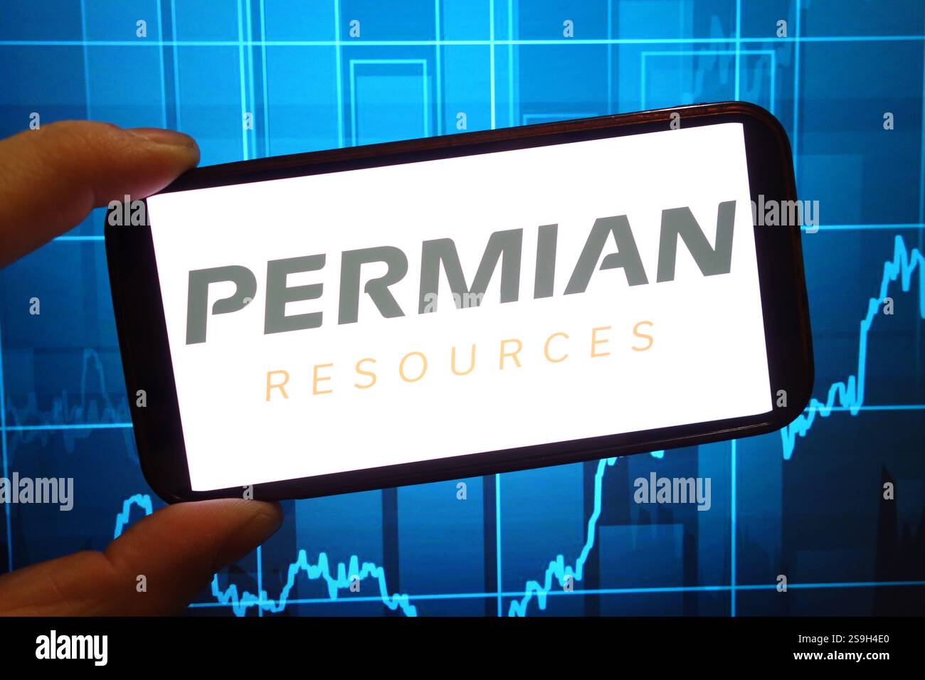 In this photo illustration, the Permian Resources company logo is seen displayed on a smartphone ...
