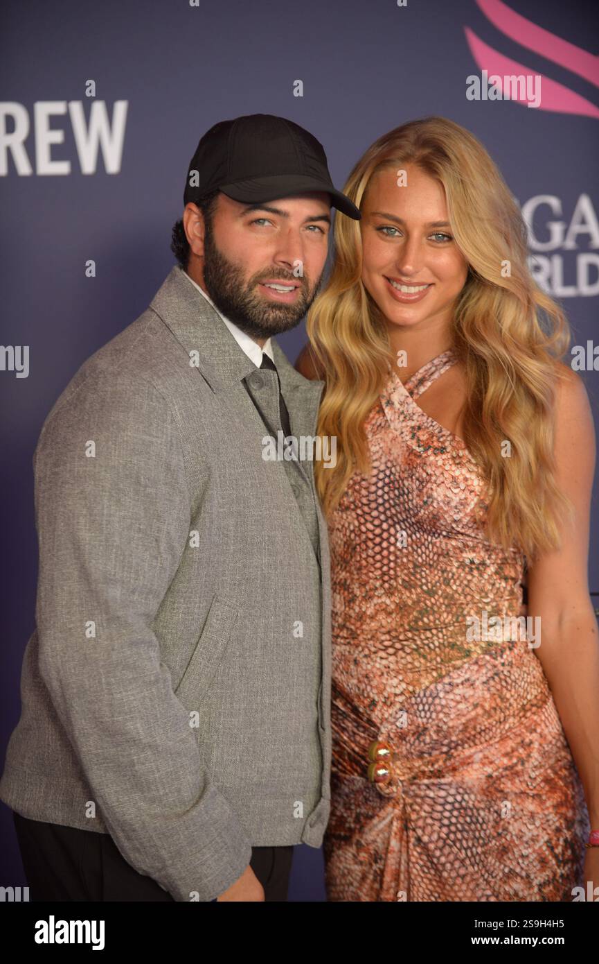 HALLANDALE BEACH, FLORIDA - JANUARY 25: Jencarlos Canela and Olivia Elliott attend Pegasus World ...