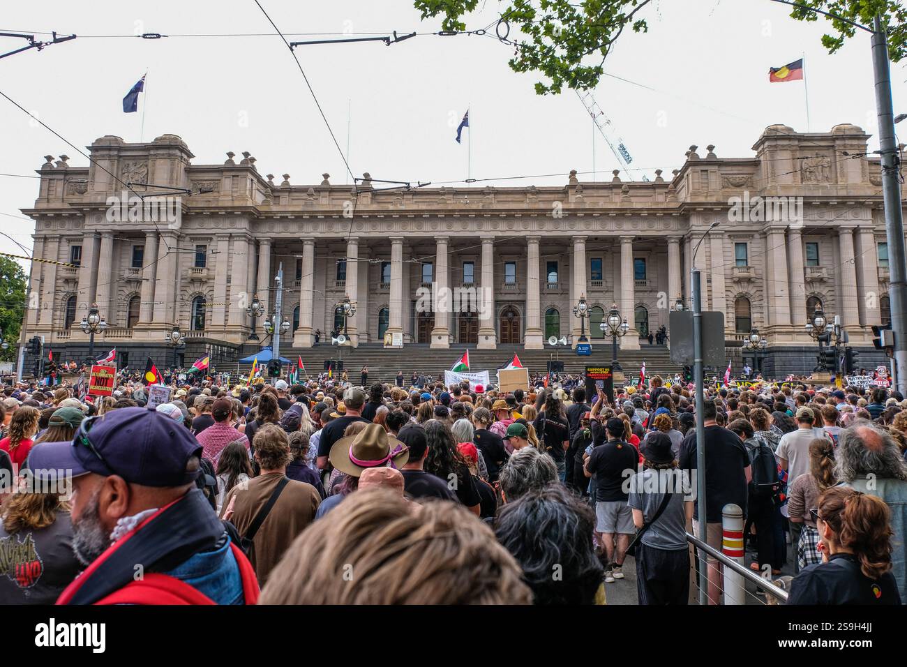 Crowds filled streets in front of Parliament of Victoria during ...