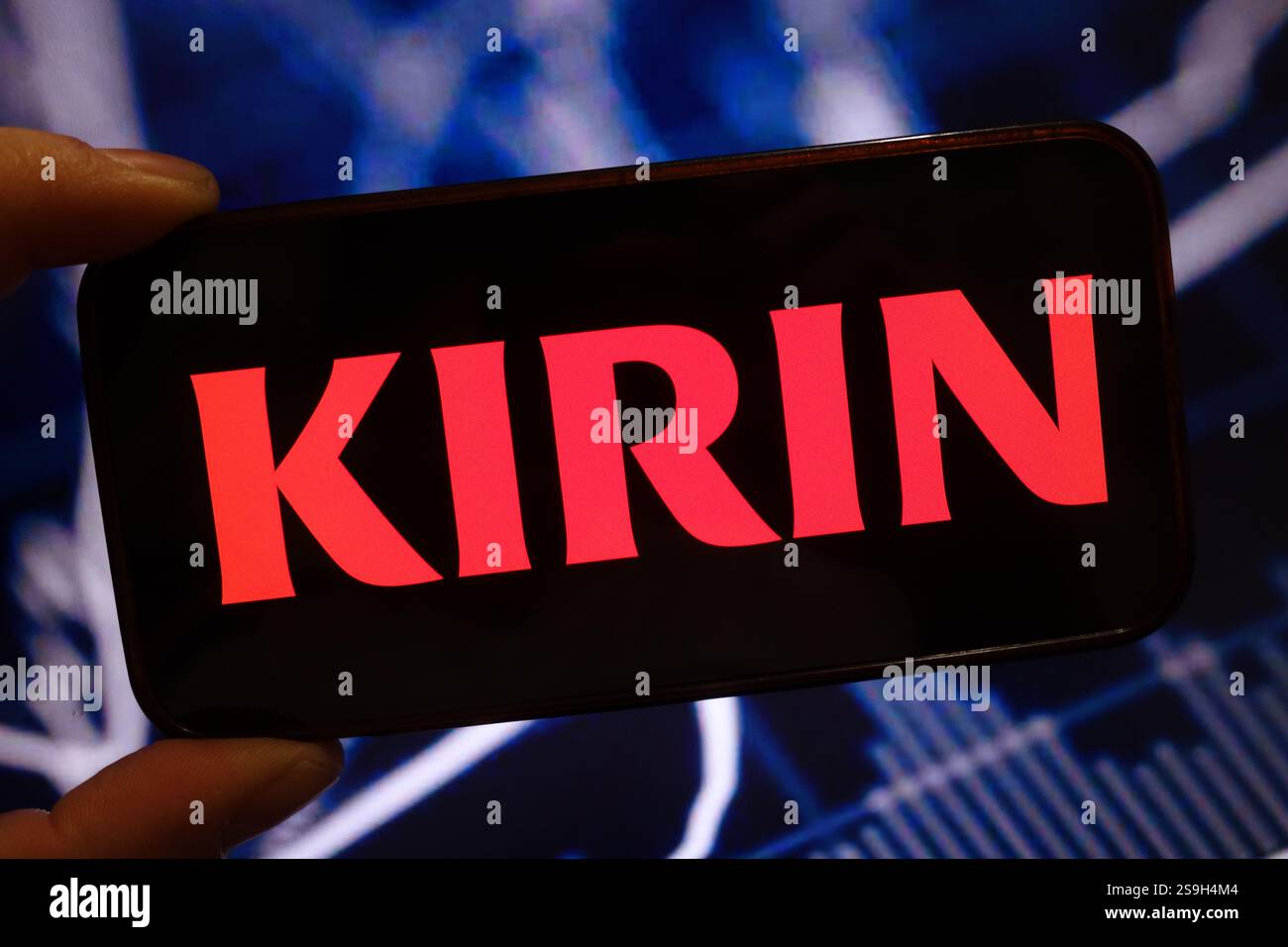 In this photo illustration, the Kirin Holdings company logo is seen displayed on a smartphone ...