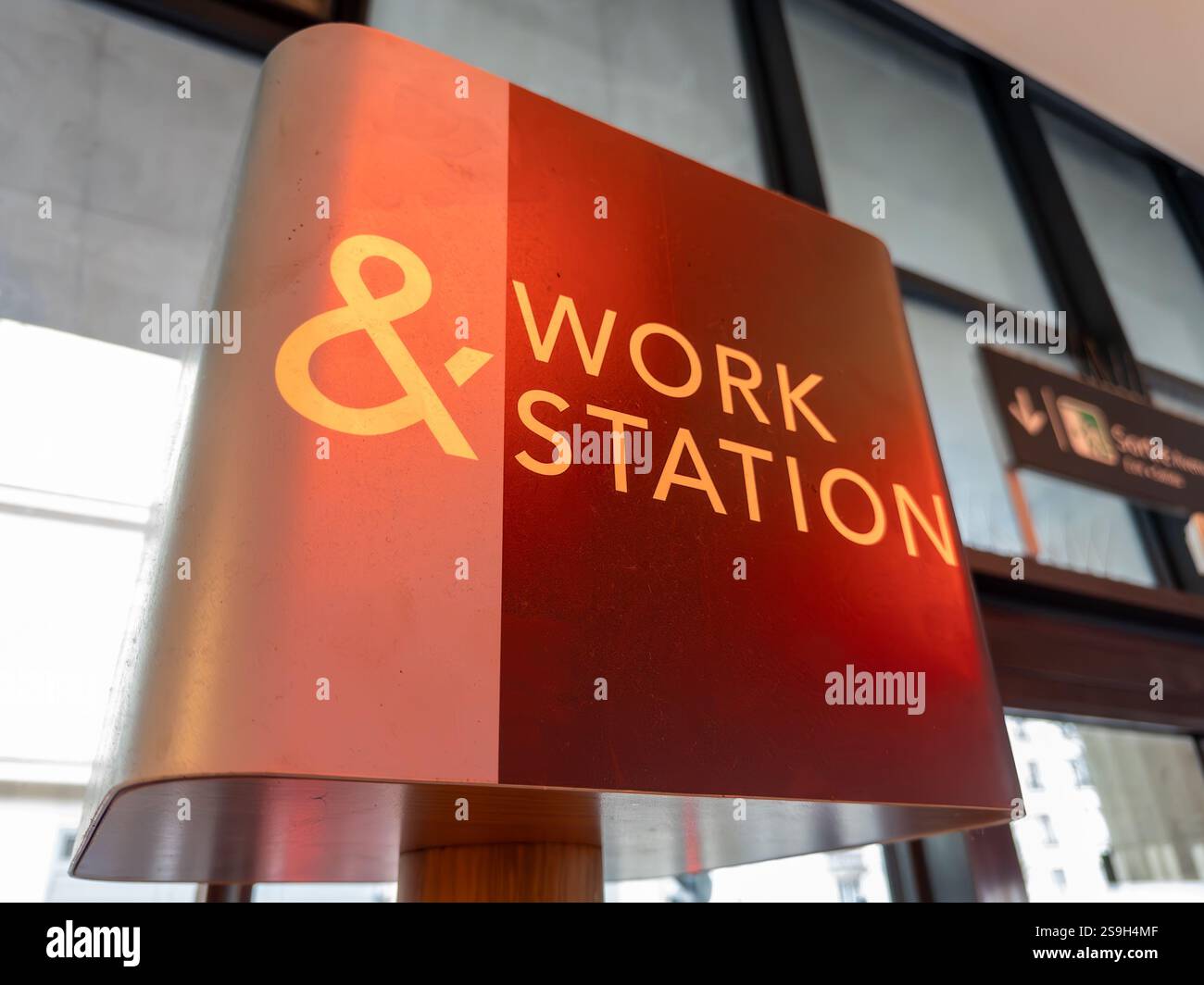 Cozy workspace sign glows warmly, inspiring creativity and productivity ...