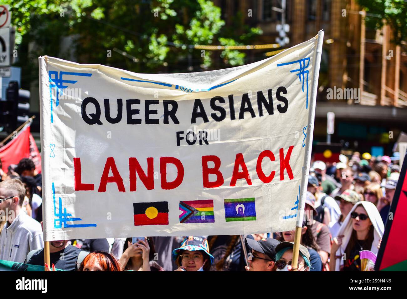 Queer Asians hold a banner during "Invasion Day" rally against ...