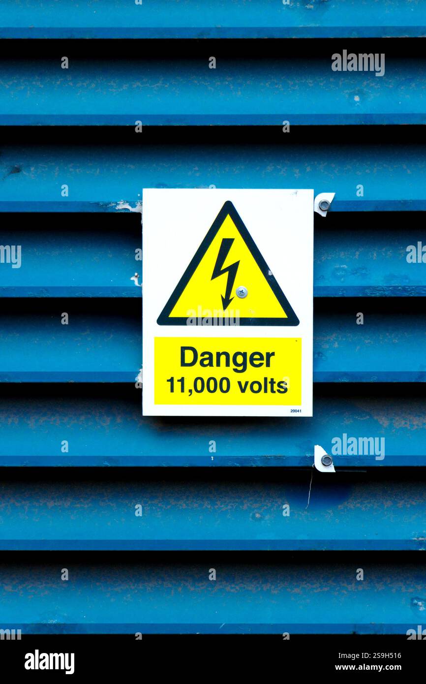 close up of danger warning sign danger of death by electrocution 11,000 ...