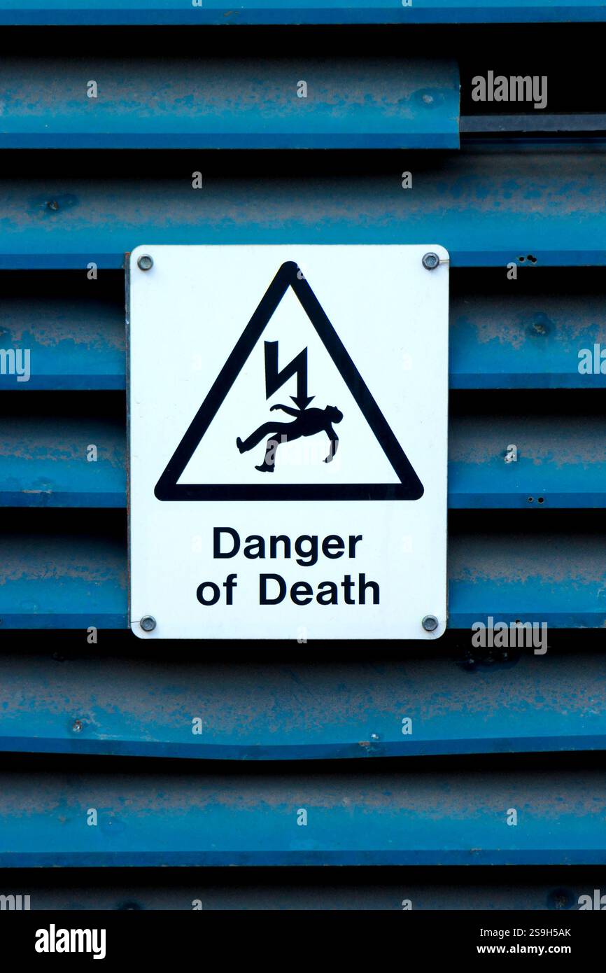 close up of danger warning sign danger of death by electrocution 11,000 ...