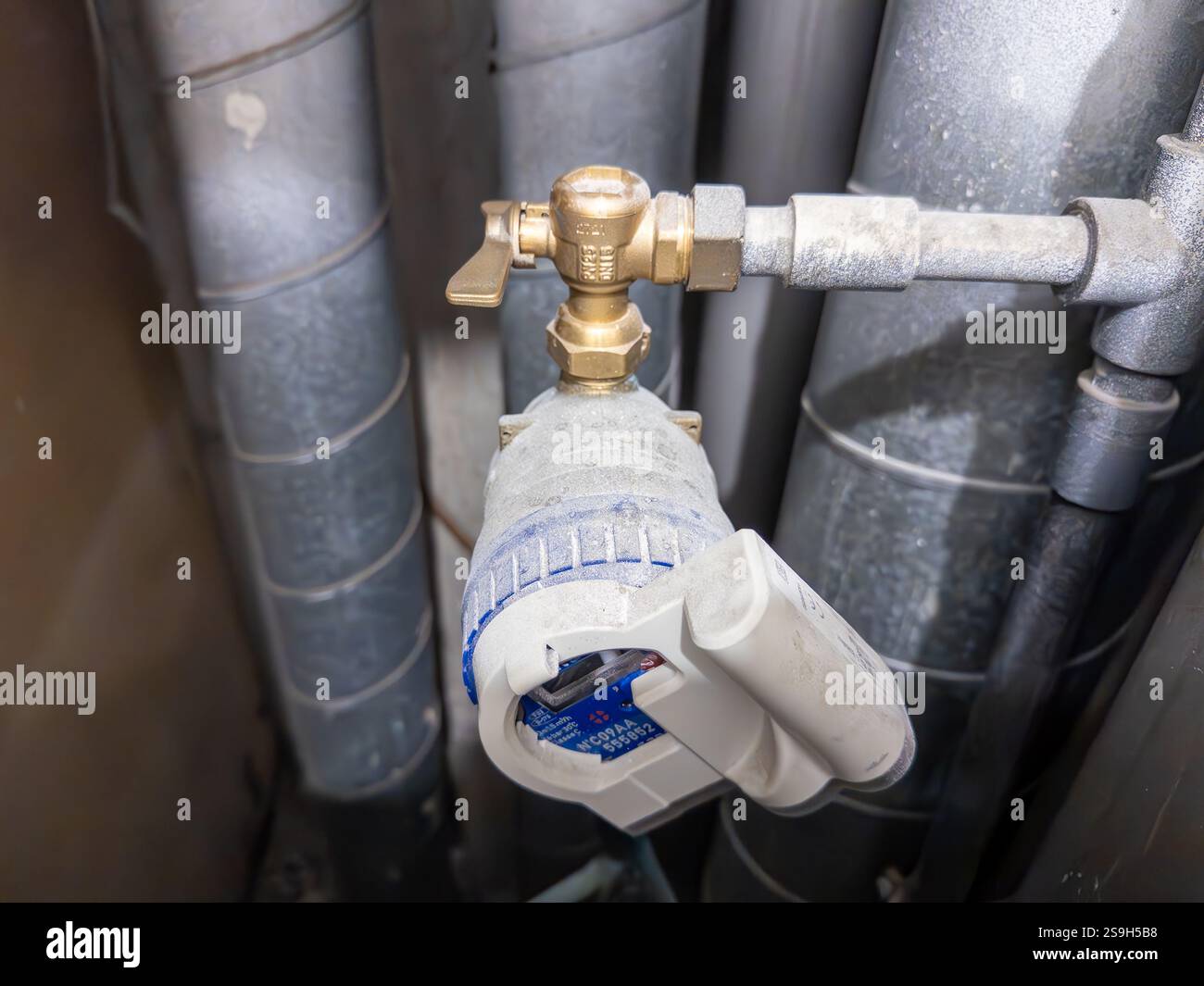 Valve adjusting flow in a commercial building's utility system at dusk ...