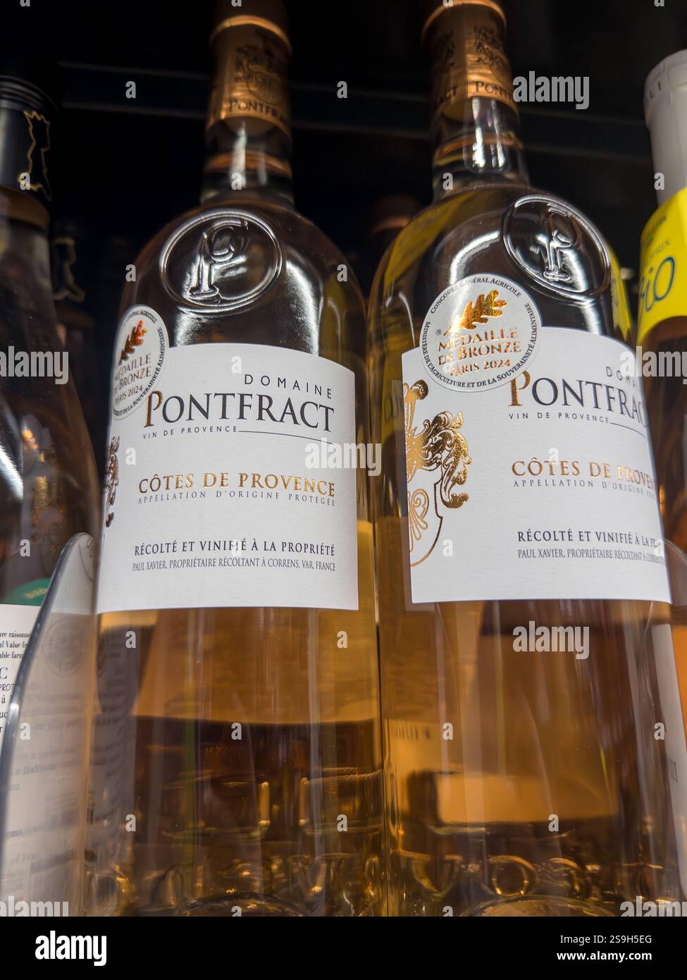 Bottles of Pontfract white wine on display in a vibrant store setting ...