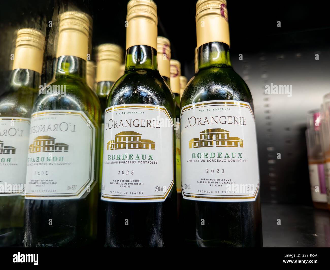 Wine bottles on display in a French store showcase vintage and quality ...