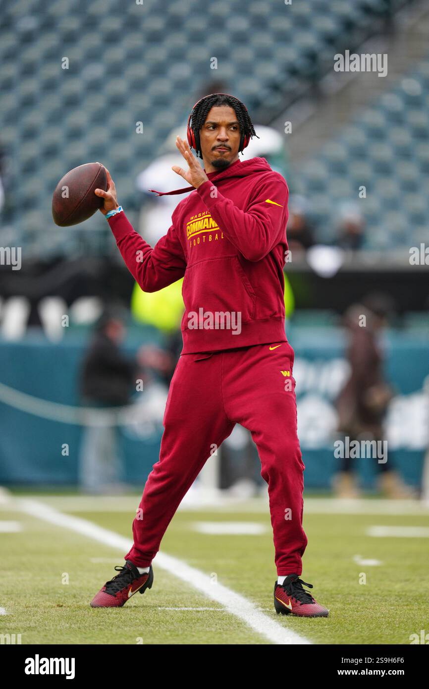 Washington Commanders quarterback Jayden Daniels warms up before the ...