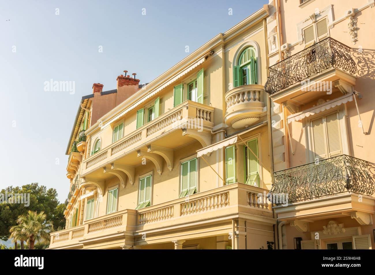 Colorful Mediterranean house facades of luxury buildings with ornate ...