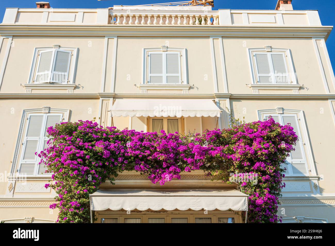 Colorful Mediterranean house facades of luxury buildings with ornate ...