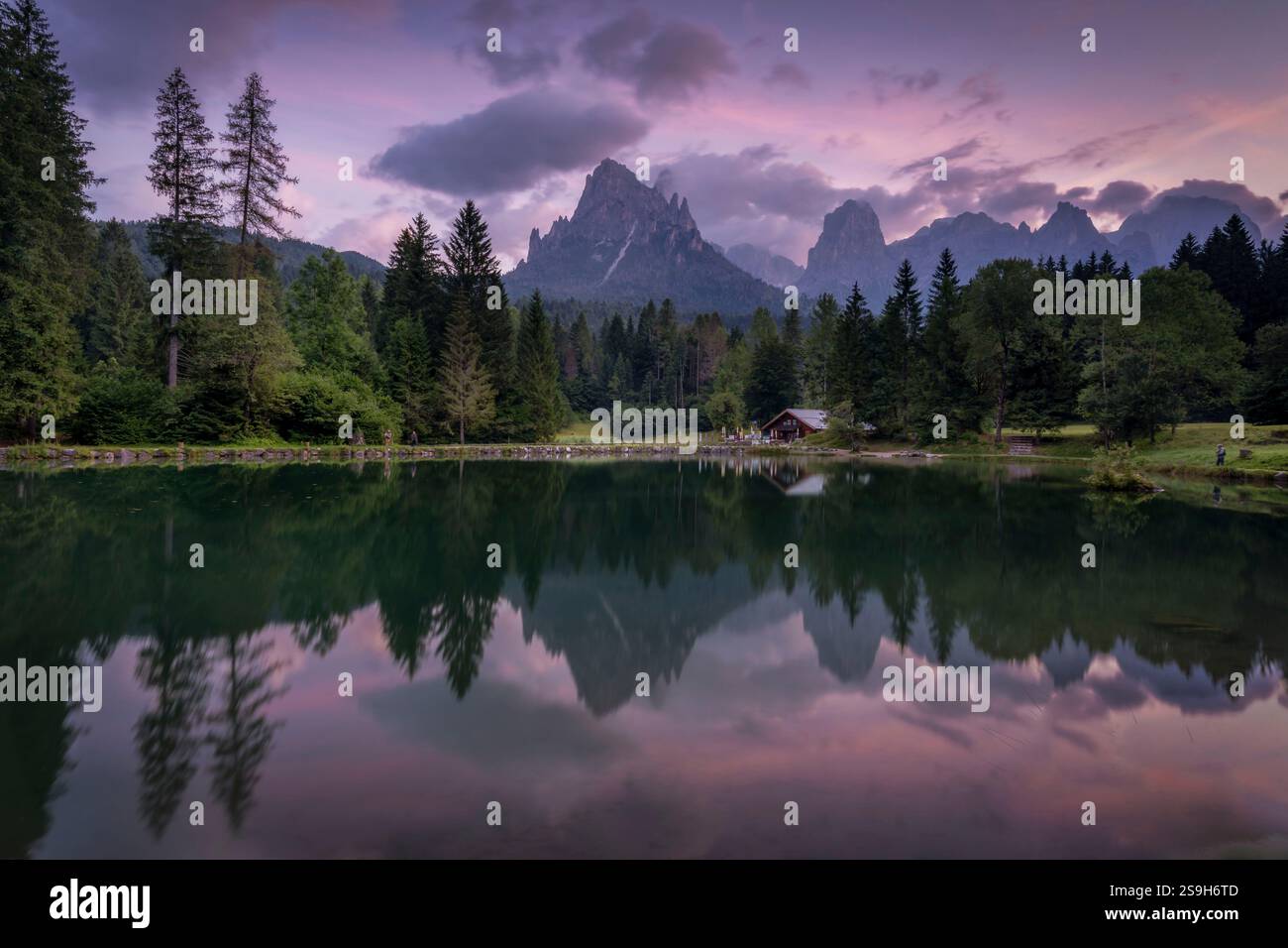 Red hour sunrise at Welsperg lake with Dolomites reflections Stock ...