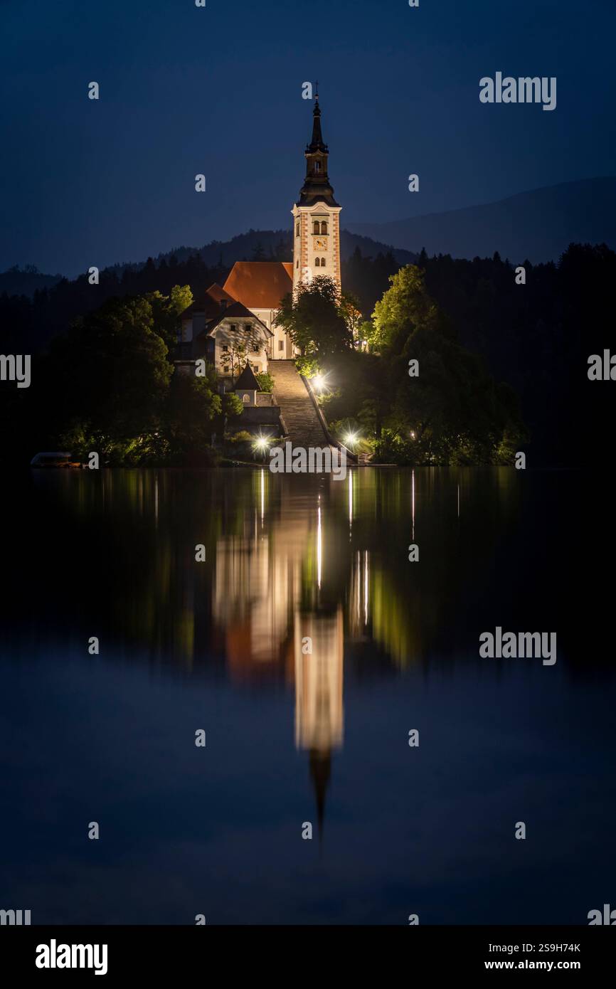 Lake Bled at night with reflections Stock Photo - Alamy