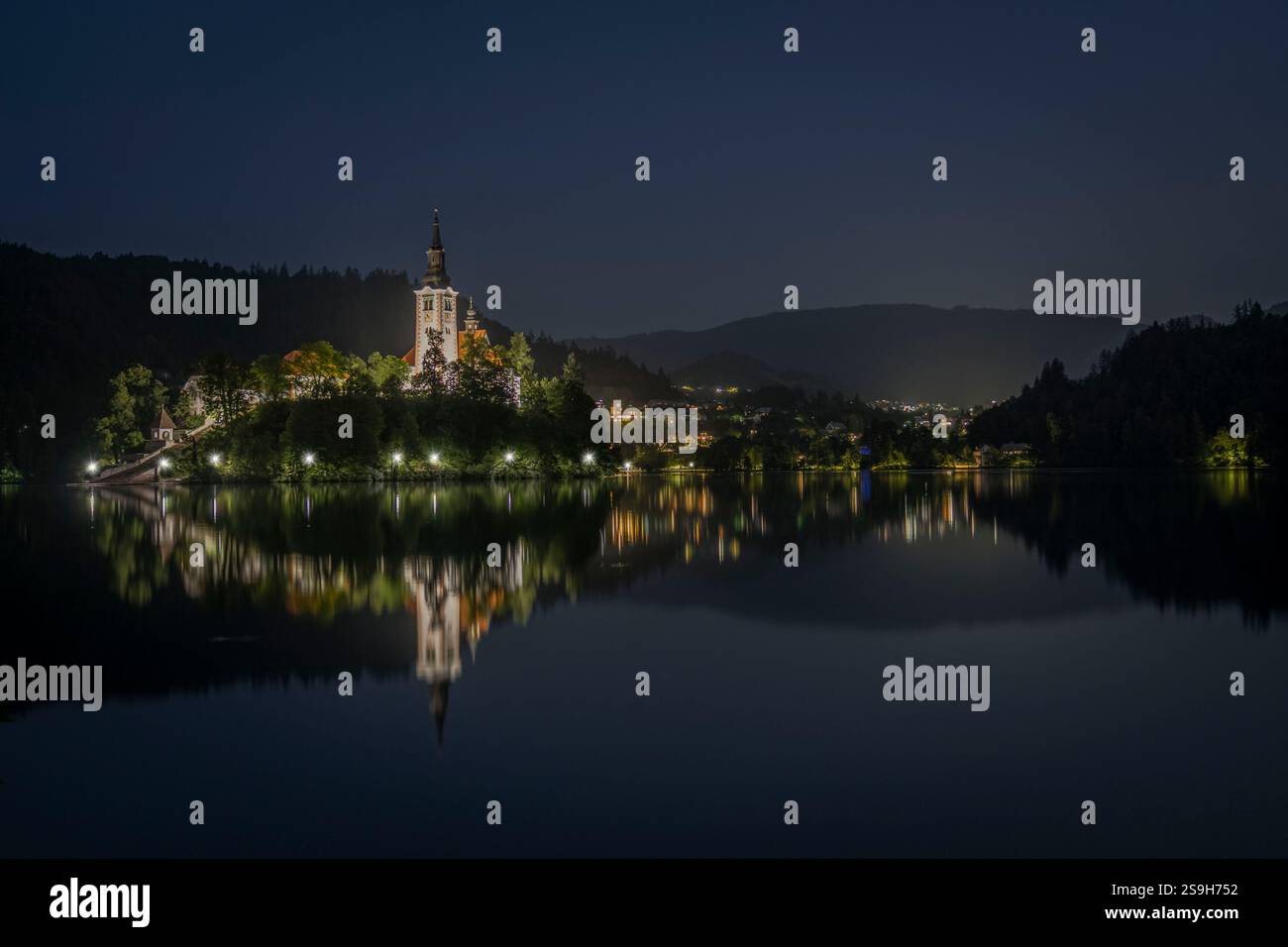 Lake Bled at night with reflections Stock Photo - Alamy