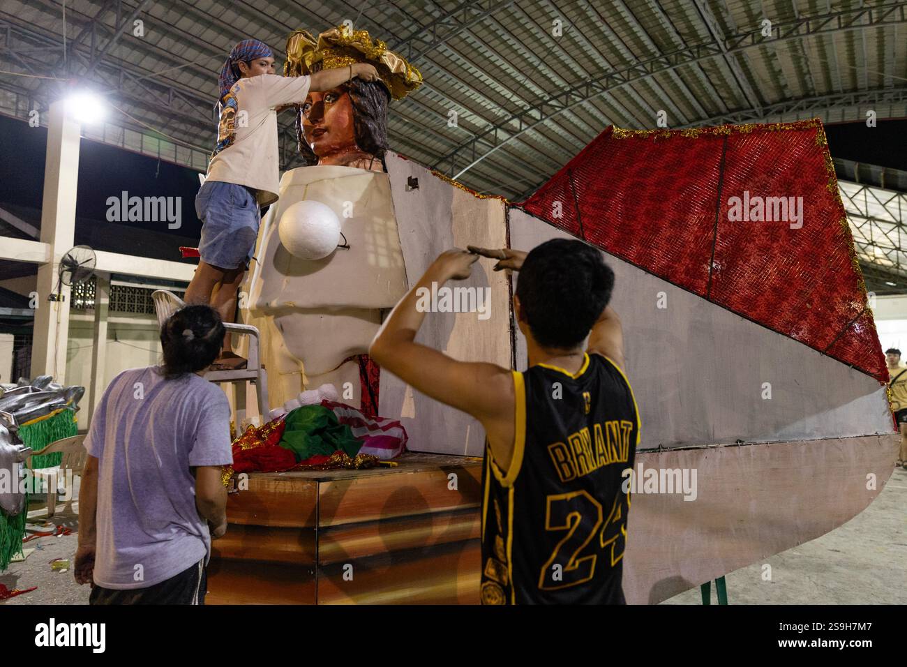 Props men from the Parianon tribe do final touches to props a few hours ...