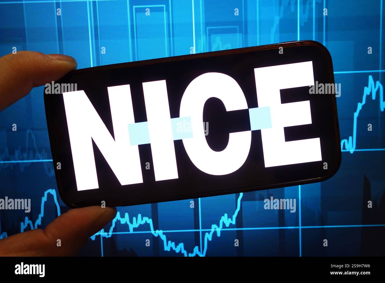 In this photo illustration, the NICE Ltd company logo is seen displayed ...