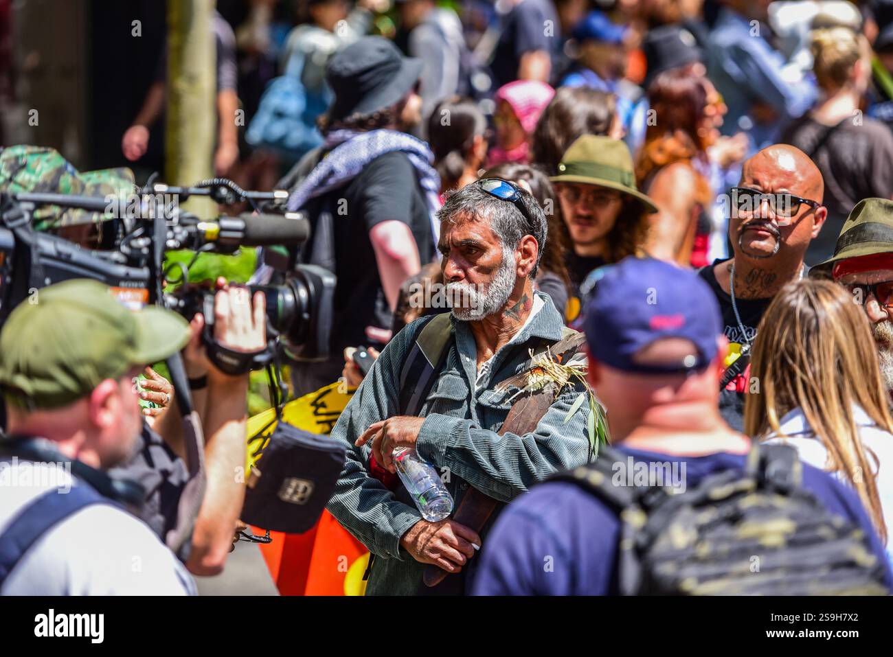 An elderly protesters is interviewed during "Invasion Day" rally ...