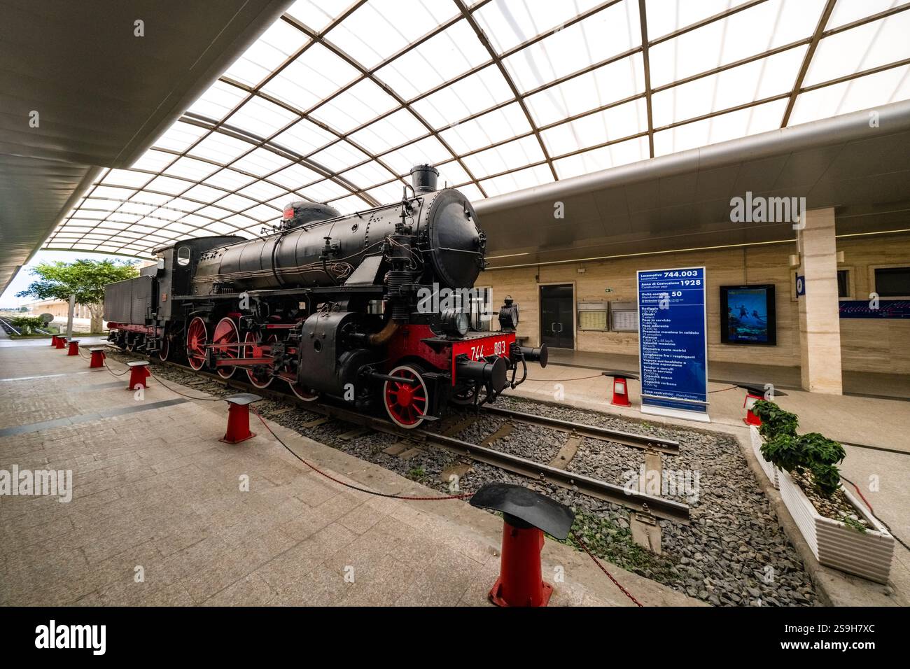 A historic steam locomotive on display at Cagliari's main railway ...