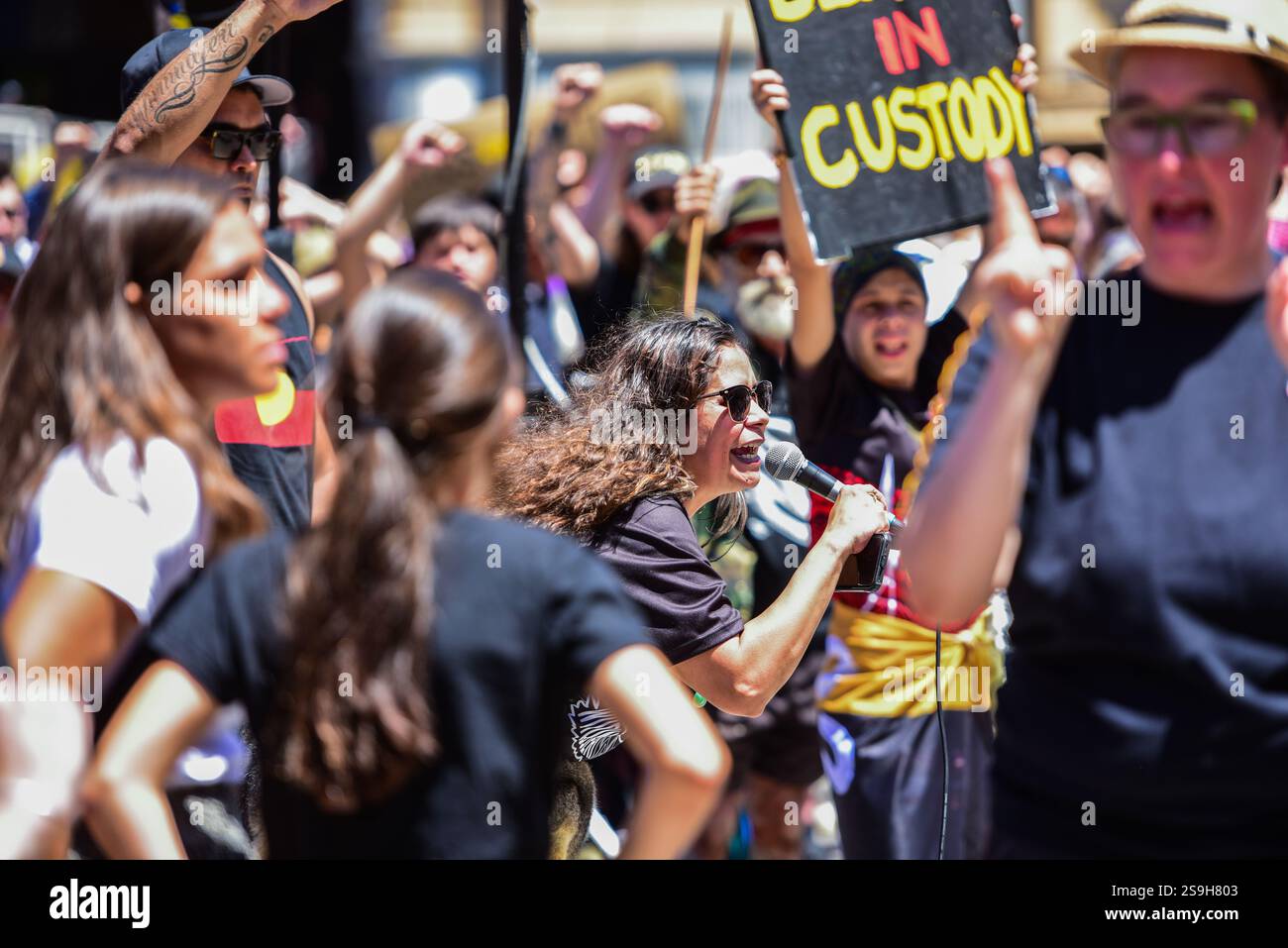 Indigenous protester speaks during "Invasion Day" rally against ...