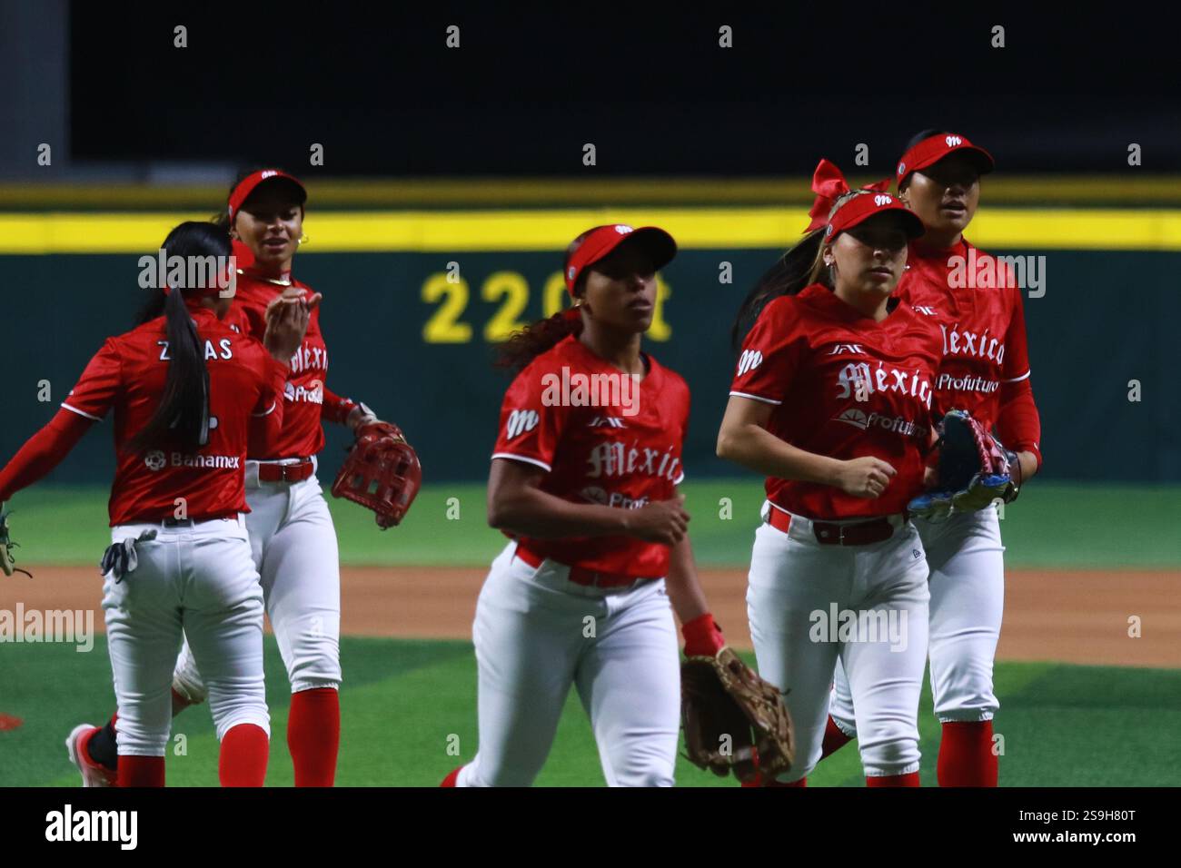 Non Exclusive: Members of Diablos Rojos team enter the field during the ...