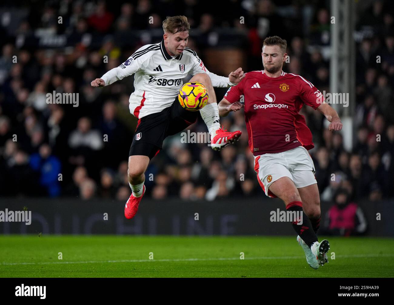 Fulham's Emile Smith Rowe (left) and Manchester United's Matthijs de ...