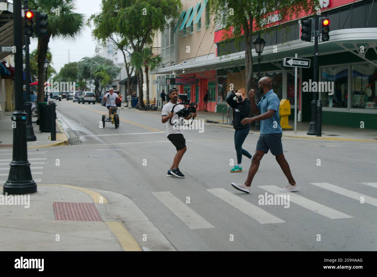 Woman recording video walking hi-res stock photography and images - Alamy