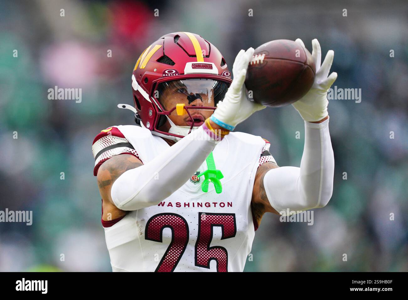 Washington Commanders cornerback Benjamin St-Juste warms up before the ...