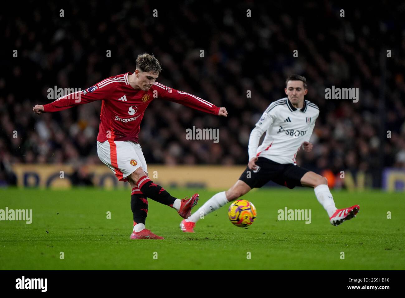 Manchester United's Alejandro Garnacho (left) and Fulham's Timothy ...